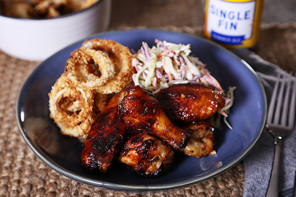 Sticky Vegemite Chicken Wings with Oven Baked Onion Rings and Slaw ...